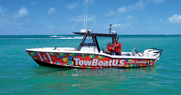 Puzzle-Wrapped TowBoatU.S. Boat Raises Autism Awareness | BoatUS